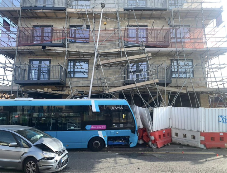 Bus Collides with Car and Crashes into Scaffolding on Jeffery Street ...